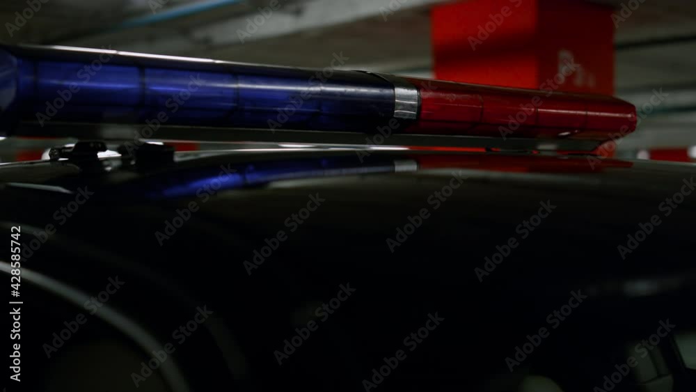 Lights flashing on police car. Police flasher lighting on roof of ...