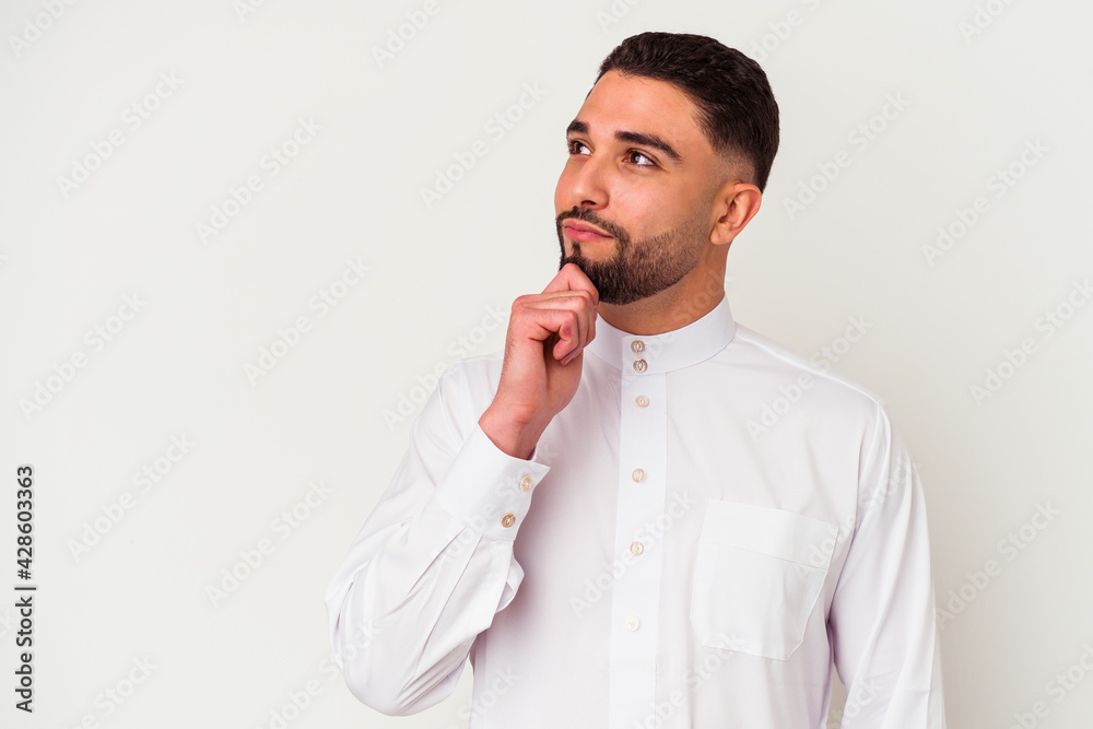 Young arab man wearing typical arab clothes isolated on white ...