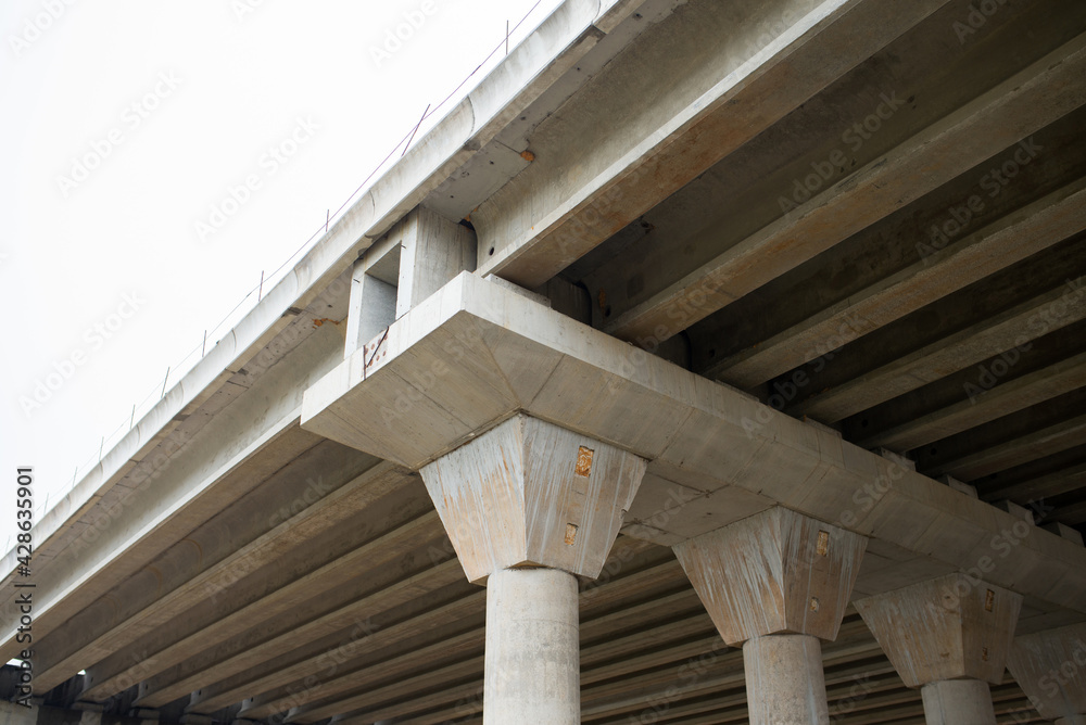 top of reinforced concrete columns with overlapping transport bridge ...