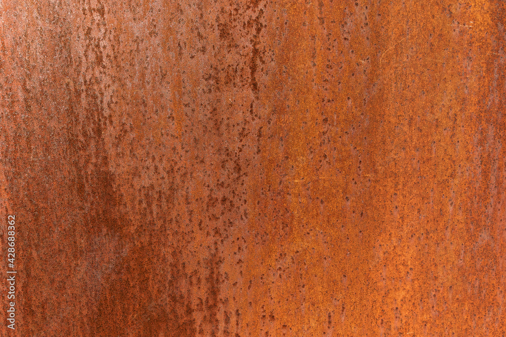 Smooth, slightly rough weathered and rusted orange-red colors surface ...
