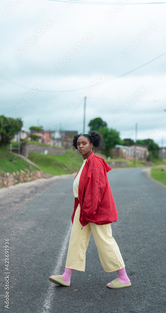 Teenage girl on the road Stock Photo | Adobe Stock