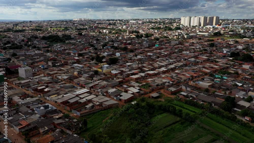 The Sol Nascente favela below and modern high-rise buildings in the ...