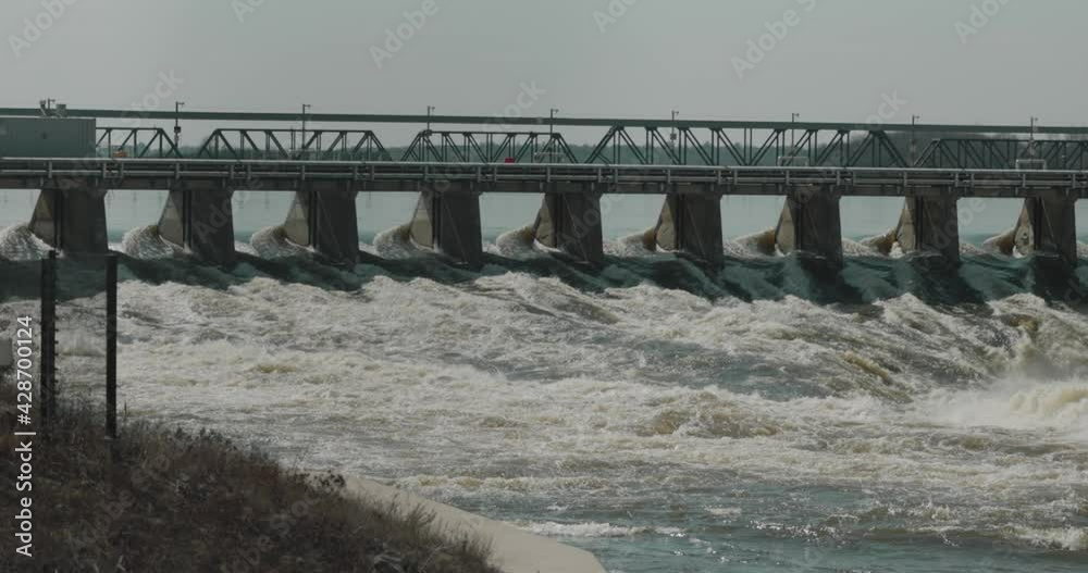 Water rushing through the levee of the Hydro Electric Dam on the Ottawa ...