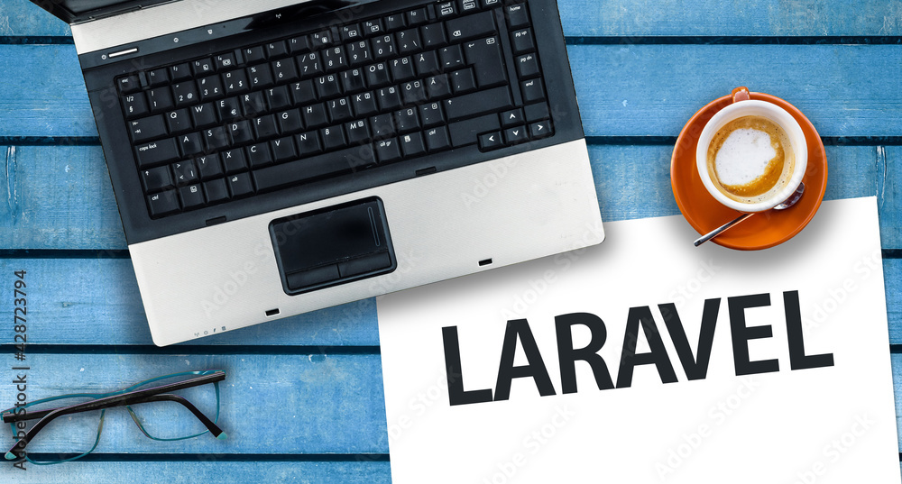 Laravel PHP Framework programming language. Word Laravel on paper and laptop foto de Stock ...