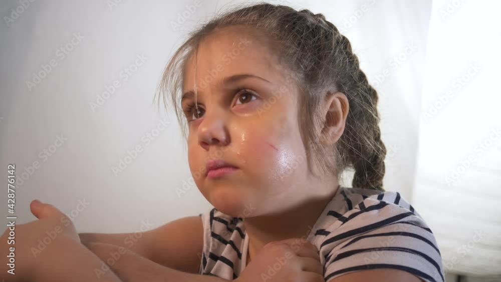 Stockvideon Girl is cry in corner. Violence against children in family ...