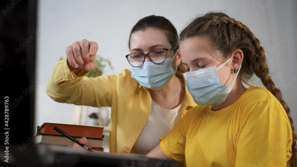 Happy family. Distance learning in a mask. Online school. Teamwork ...