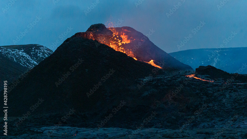 GELDINGADALUR, ICELAND. Erupting Fagradalsfjall volcano at night, 52 km ...