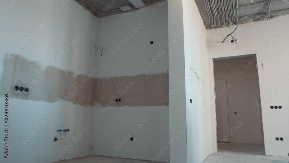 White Wall with Circular Electrical Outlets Junction Boxes in the Wall ...