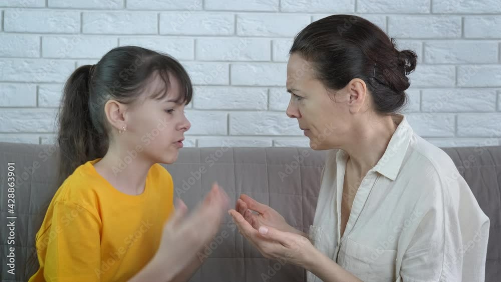 Mother and daughter are fighting. Problems with a growing daughter. A ...