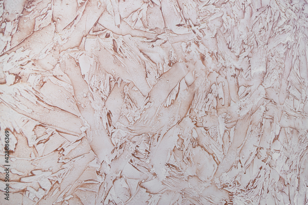 Decorative plaster of brown color with textured smear, wall surface ...