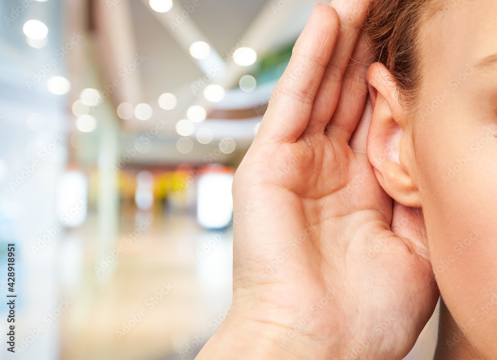 Businessman holds his hand near his ear and listening something Stock ...