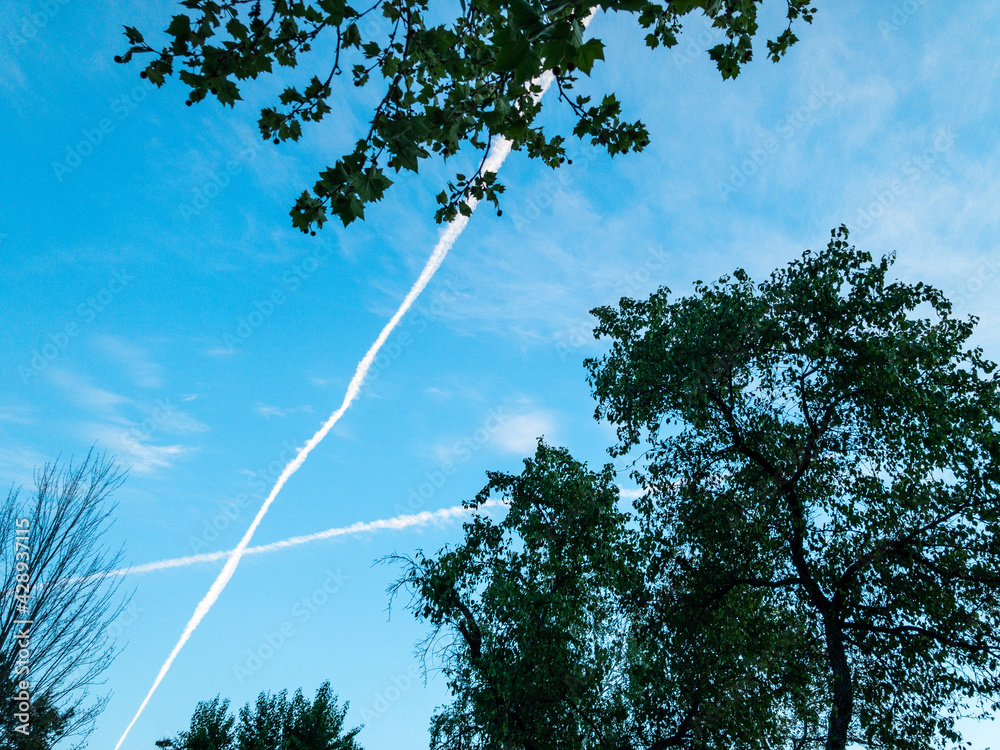 Jet fighter airplane contrails vapor trails in the sky Stock Photo ...