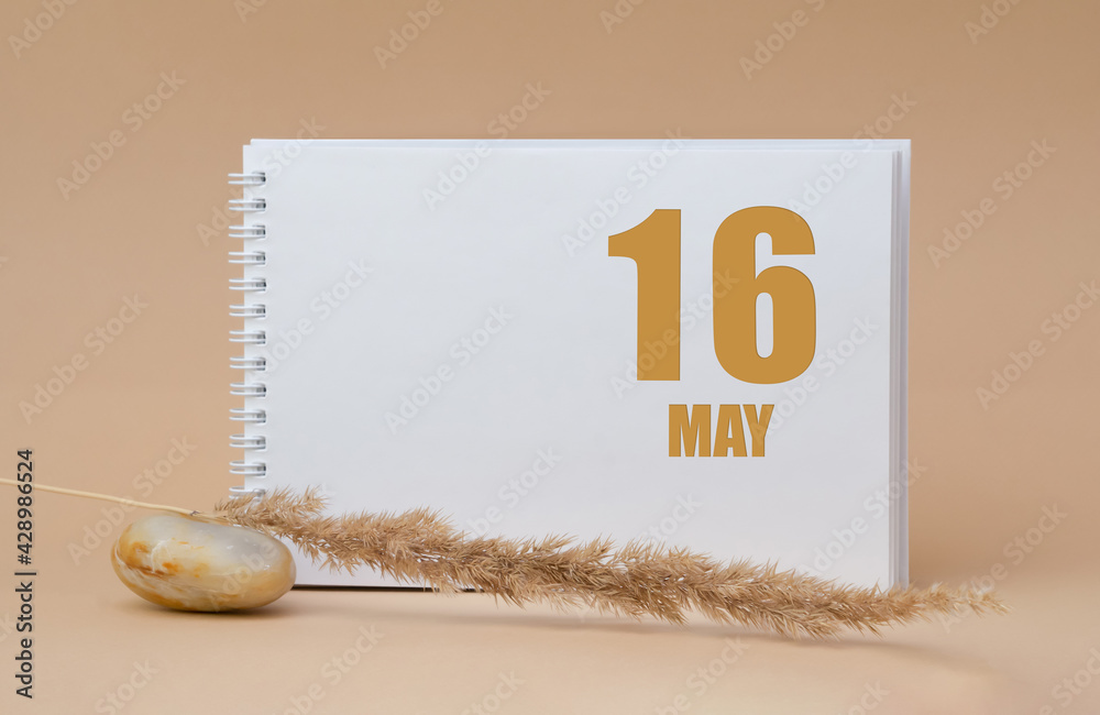 may 16. 16th day of the month, calendar date. White blank sheet of ...