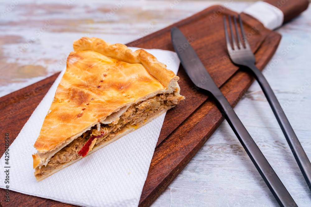 Portioin of Empanada Gallega, traditional plant of Galician cuisine, in ...