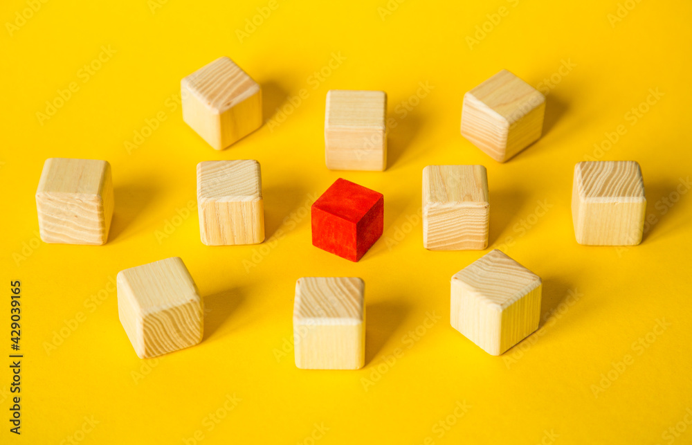 The red cube stands in the center. A symbol of authenticity. leadership ...