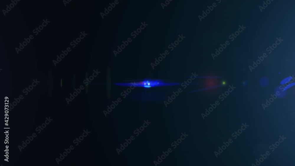 Vidéo Stock Anamorphic blue optical lens flares move in the center ...