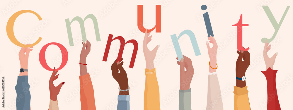 Group of raised hands holding the text Community. People diversity ...