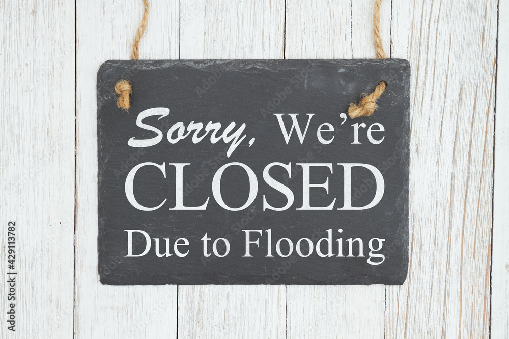 Closed Due to Flooding chalkboard sign Stock Photo | Adobe Stock