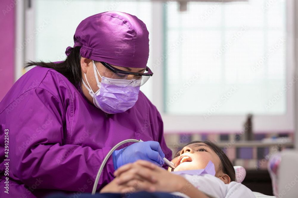 Mexican dentist, Medical checkup oral cavity of female patient with ...