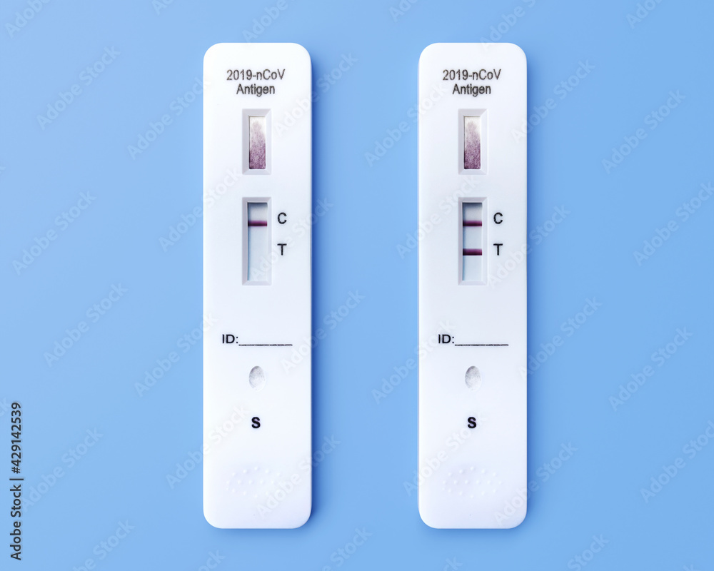 Positive and negative Result for COVID-19 with test kit side by side ...