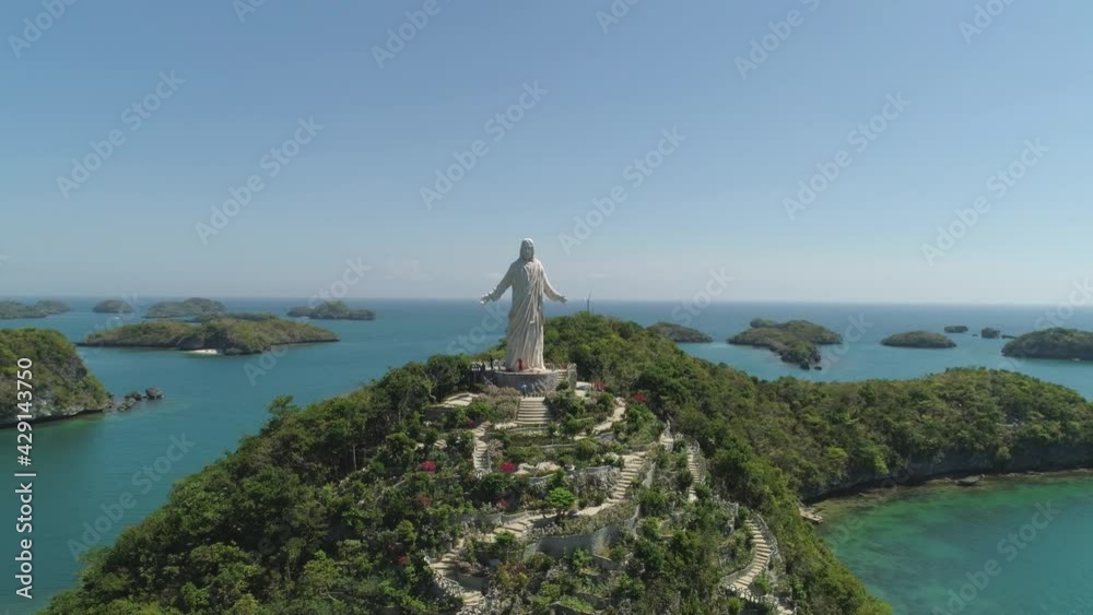 Statue of Jesus Christ on Pilgrimage island in Hundred Islands National ...