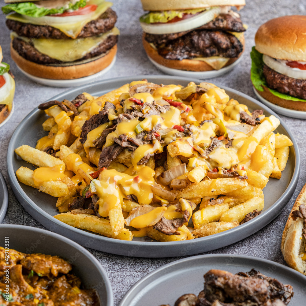 Loaded Fries Cheese Steak & Extra Cheesy Fries Stock Photo | Adobe Stock