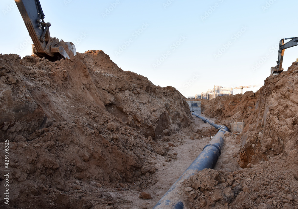 Laying sewer pipes. Sewage drainage system for a multi-story building ...