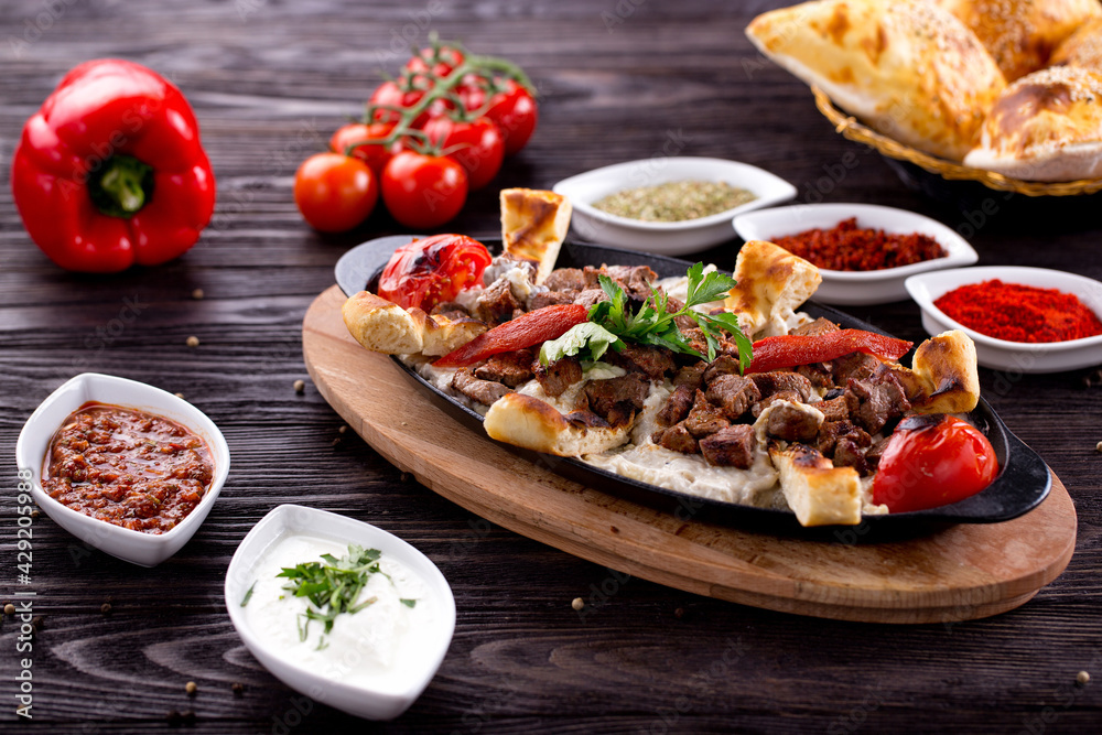 Assorted Middle Eastern and arabic dishes on a dark rustic background ...