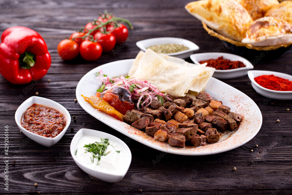 Assorted Middle Eastern and arabic dishes on a dark rustic background ...