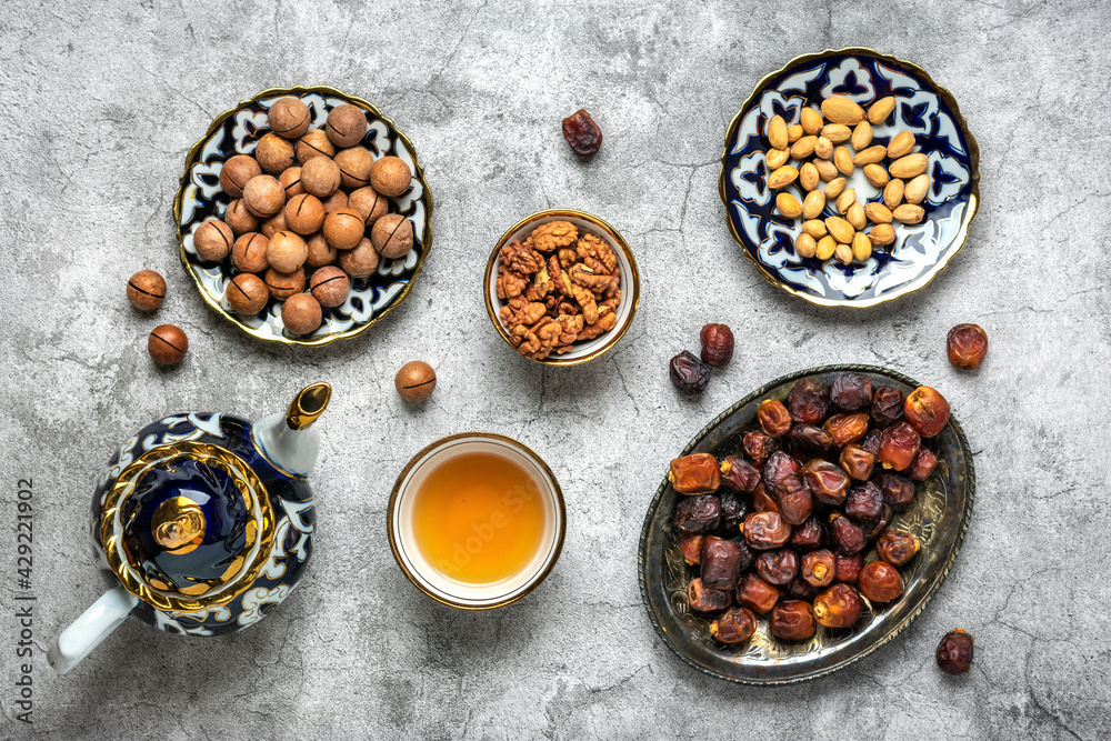 Popular food during Iftar - macadamia nuts, pistachios, walnuts, dry ...