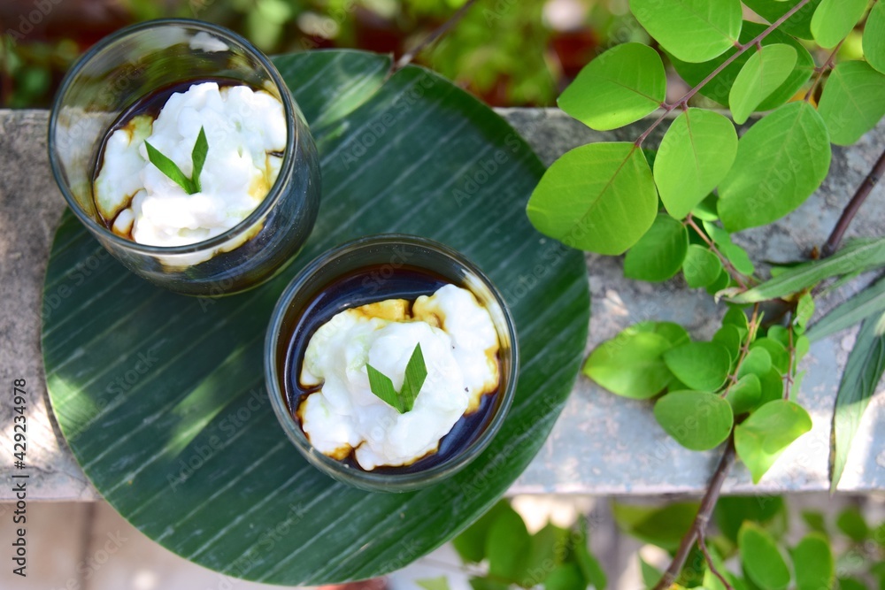 Bubur Sumsum Pandan or pandan rice porridge with Palm sugar sauce ...