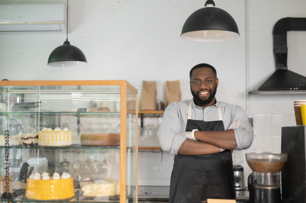 Smiling and friendly African-American small business owner, cafe ...