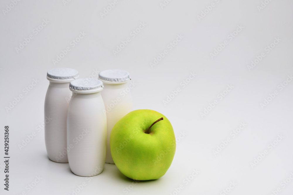 Bottles of liquid yogurt isolated on a white background. Natural liquid ...