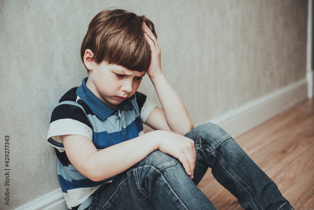Regret sad little boy sitting alone loneliness,stressed depressed child ...