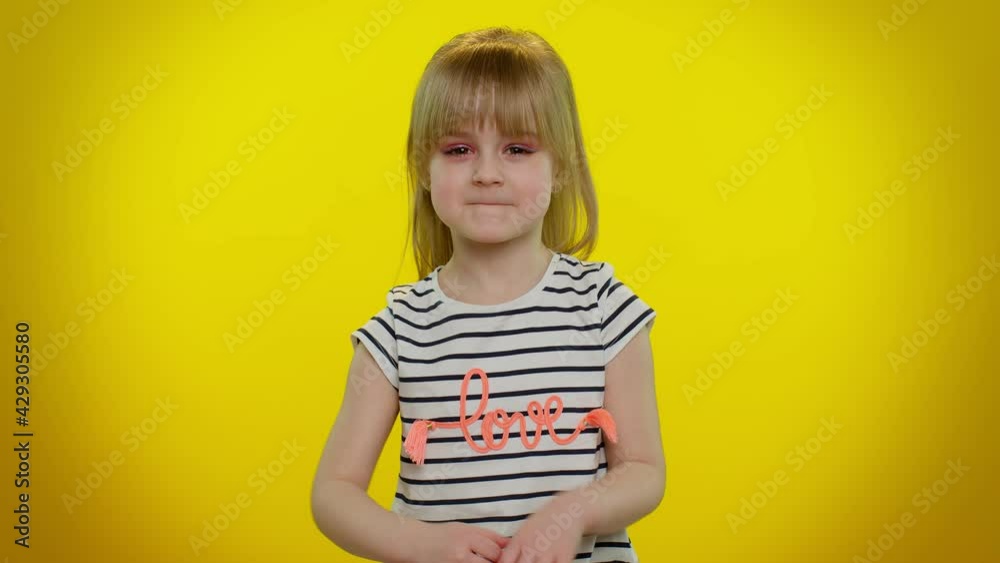 Playful cute teen child kid girl making funny silly facial expressions ...