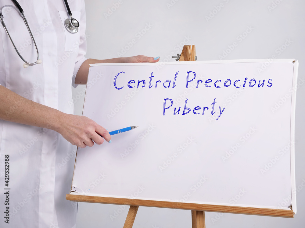 Conceptual photo about Central Precocious Puberty with handwritten text ...