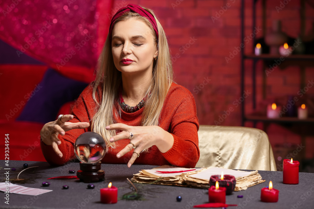 Fortune teller reading future at table Stock Photo | Adobe Stock