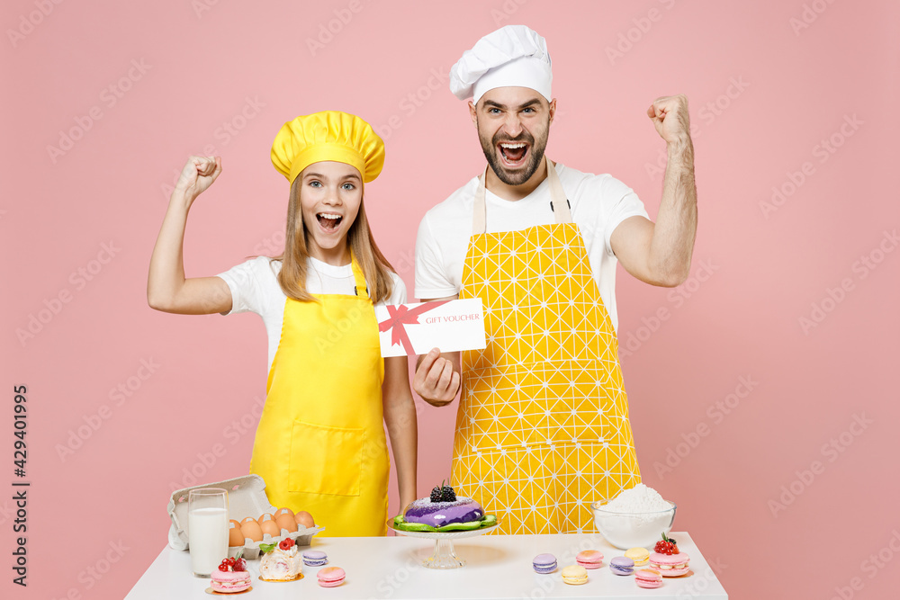 Teen fun girl dad chef cook confectioner baker in yellow apron cap at ...