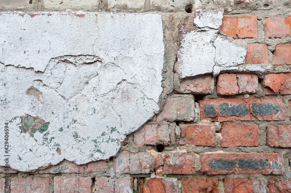 Weathered red brick wall for texture or background, rough aged ...