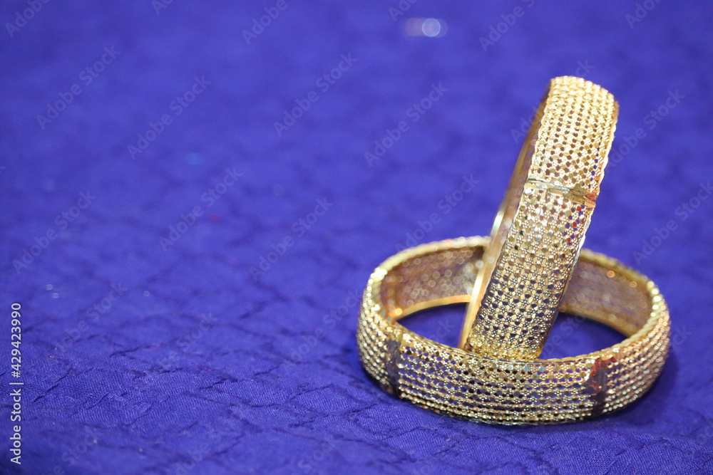 Gold Bangles Stock Photo | Adobe Stock
