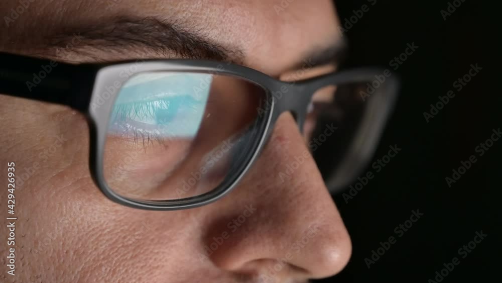 Close up portrait of a software engineer who is working: the eyes are ...