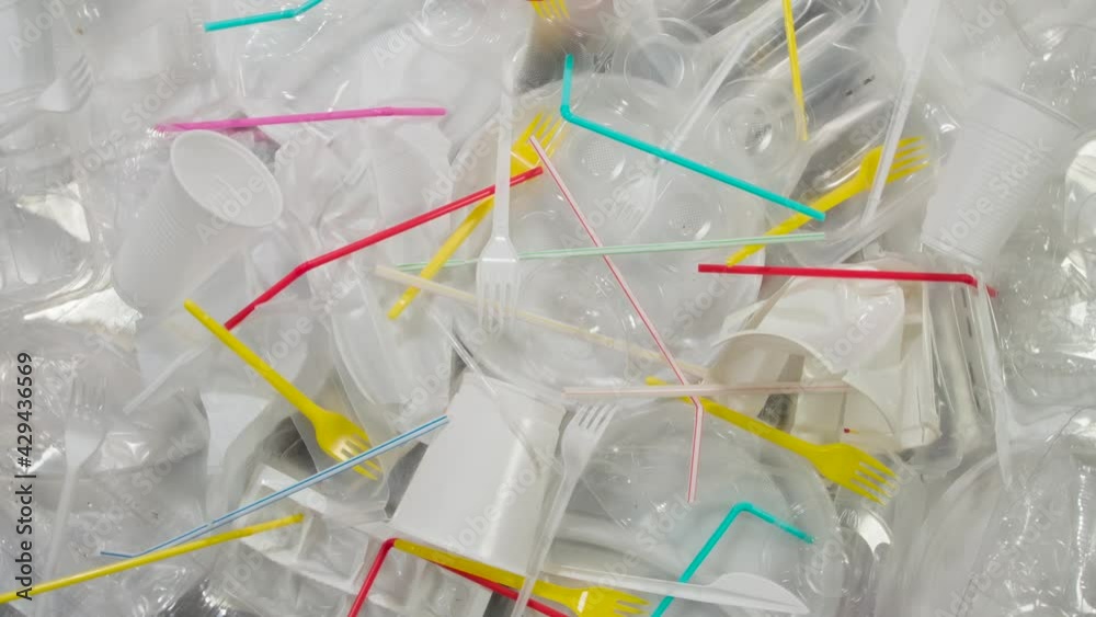 Collection and Disposal of Plastic Dishes. HD Loop. A variety of used ...