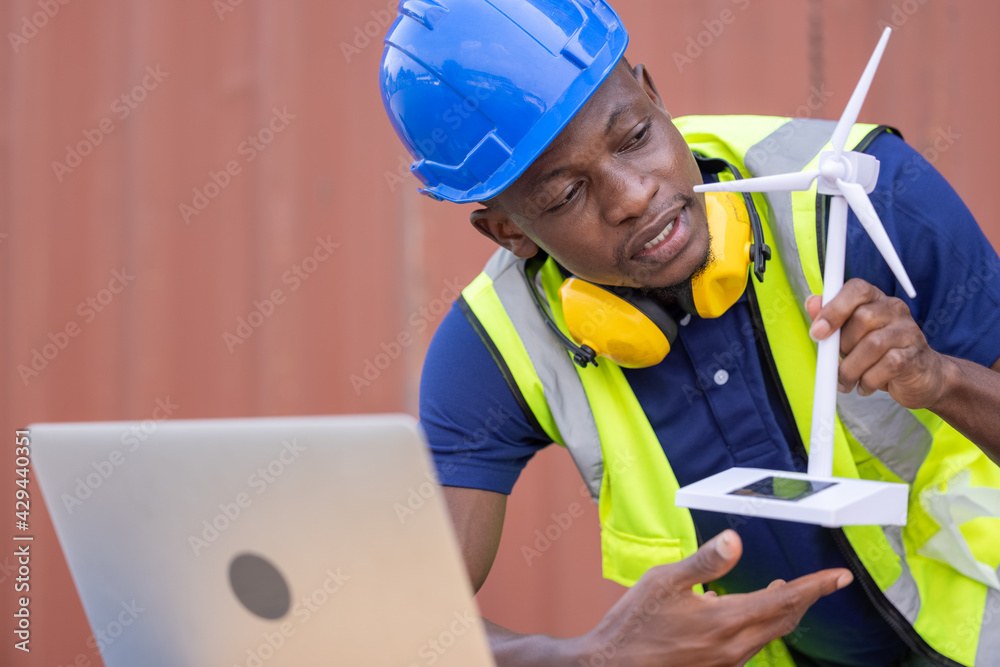 Engineer African American black worker discussing of solar energy from ...
