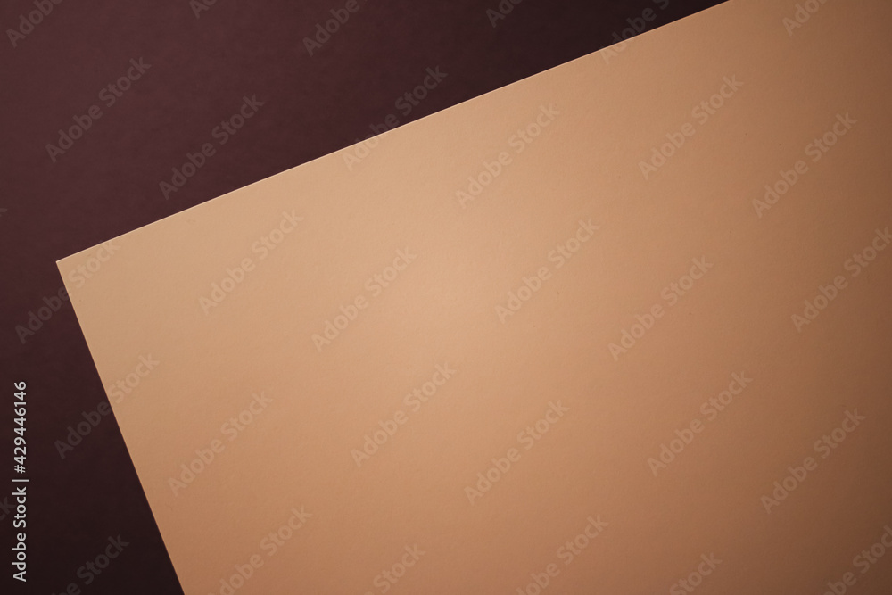 Blank A4 paper, beige on dark background as office stationery flatlay ...