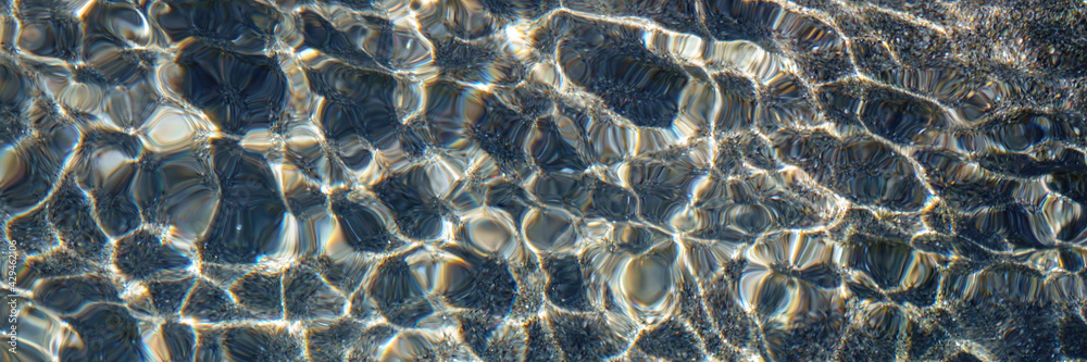 pebble water caustics background with color refractions Stock Photo ...