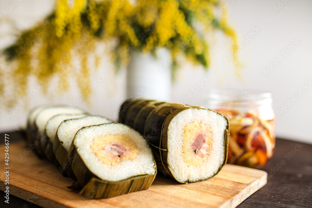 Tet cake (Glutinous rice cake stuffed with banana leaf), traditional ...