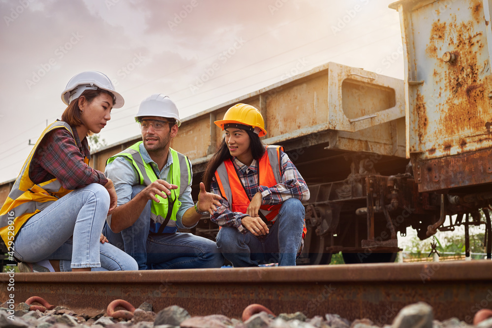 Rail transport specialist engineers are working on the train tracks ...