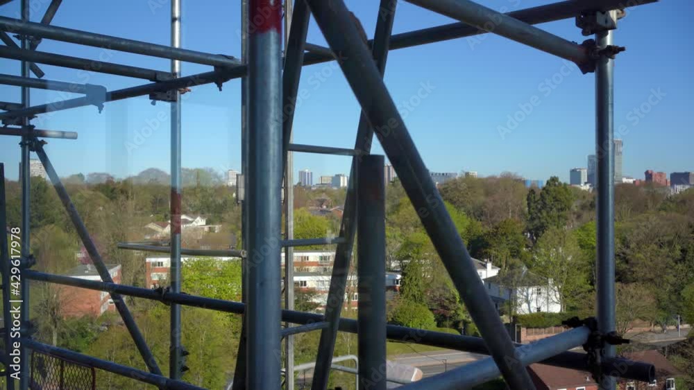 Scaffold lift or hoist. Builder's hoist on the outside of a building ...