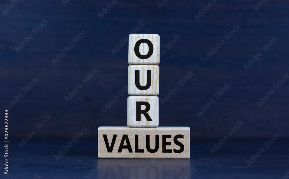 Our values symbol. Wooden cubes and block with words 'our values' on ...