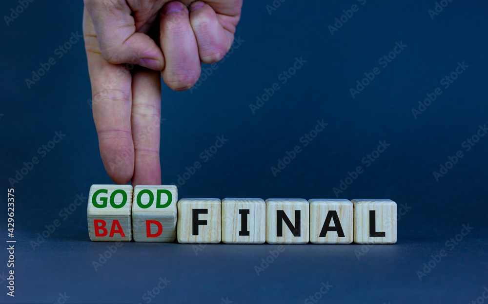 Good or bad final symbol. Businessman turns wooden cubes and changes ...